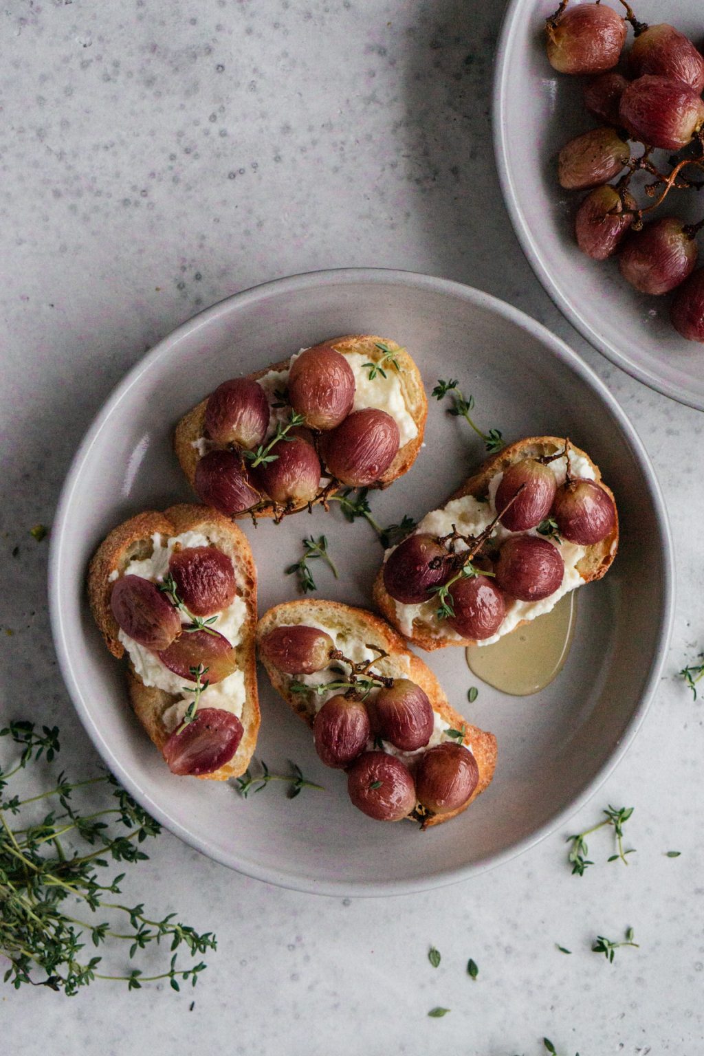 Roasted Grape Crostini With Whipped Ricotta and Honey - Pina Bresciani