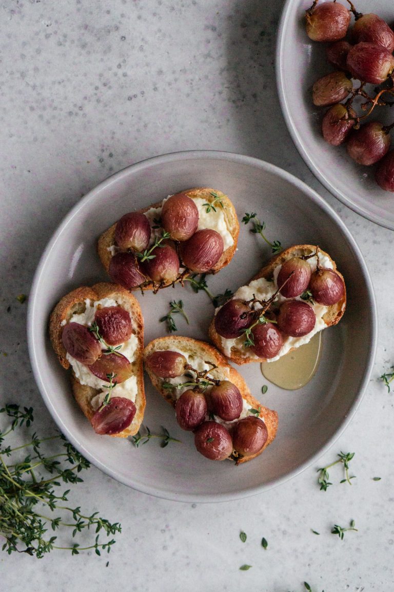 Roasted Grape Crostini With Whipped Ricotta and Honey - Pina Bresciani