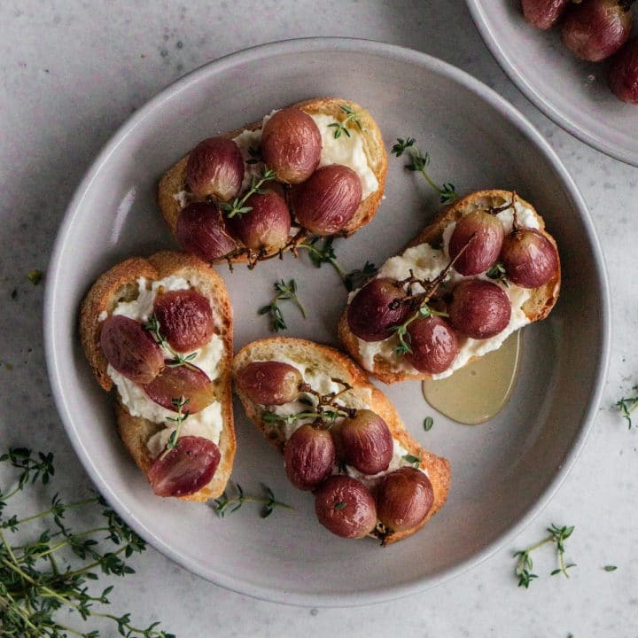 Roasted Grape Crostini With Whipped Ricotta and Honey - Pina Bresciani